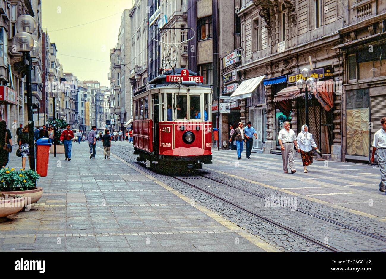 ISTANBUL, TURKEY - Aug 04, 1993: A red tramway in a street in Istanbul ...