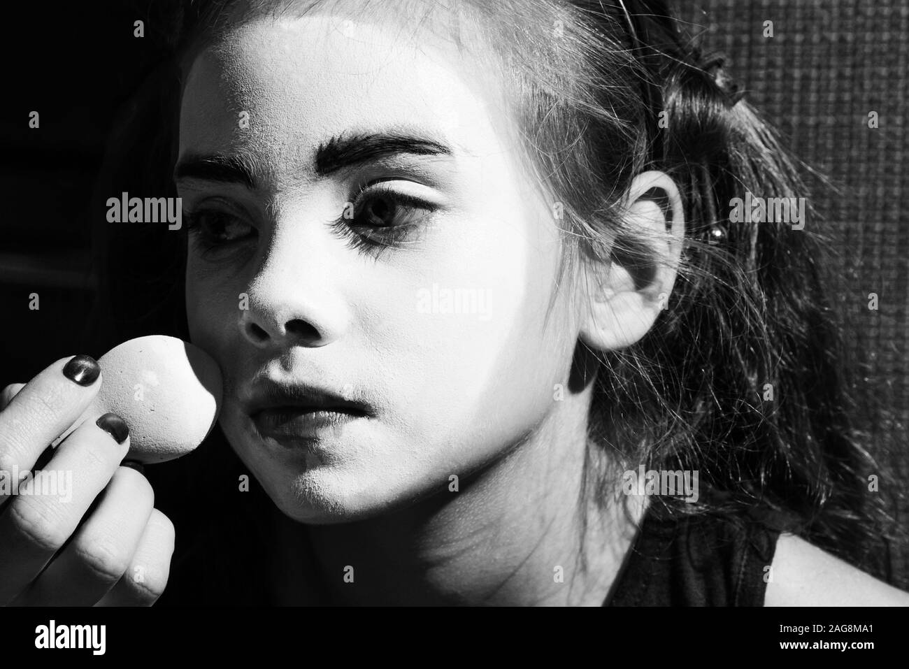 mom makes her baby makeup mime before the performance Stock Photo - Alamy