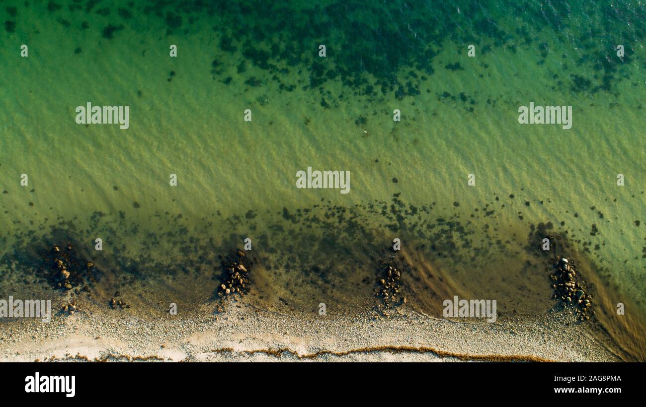 Picture of stones placed to protect the coastline Stock Photo - Alamy