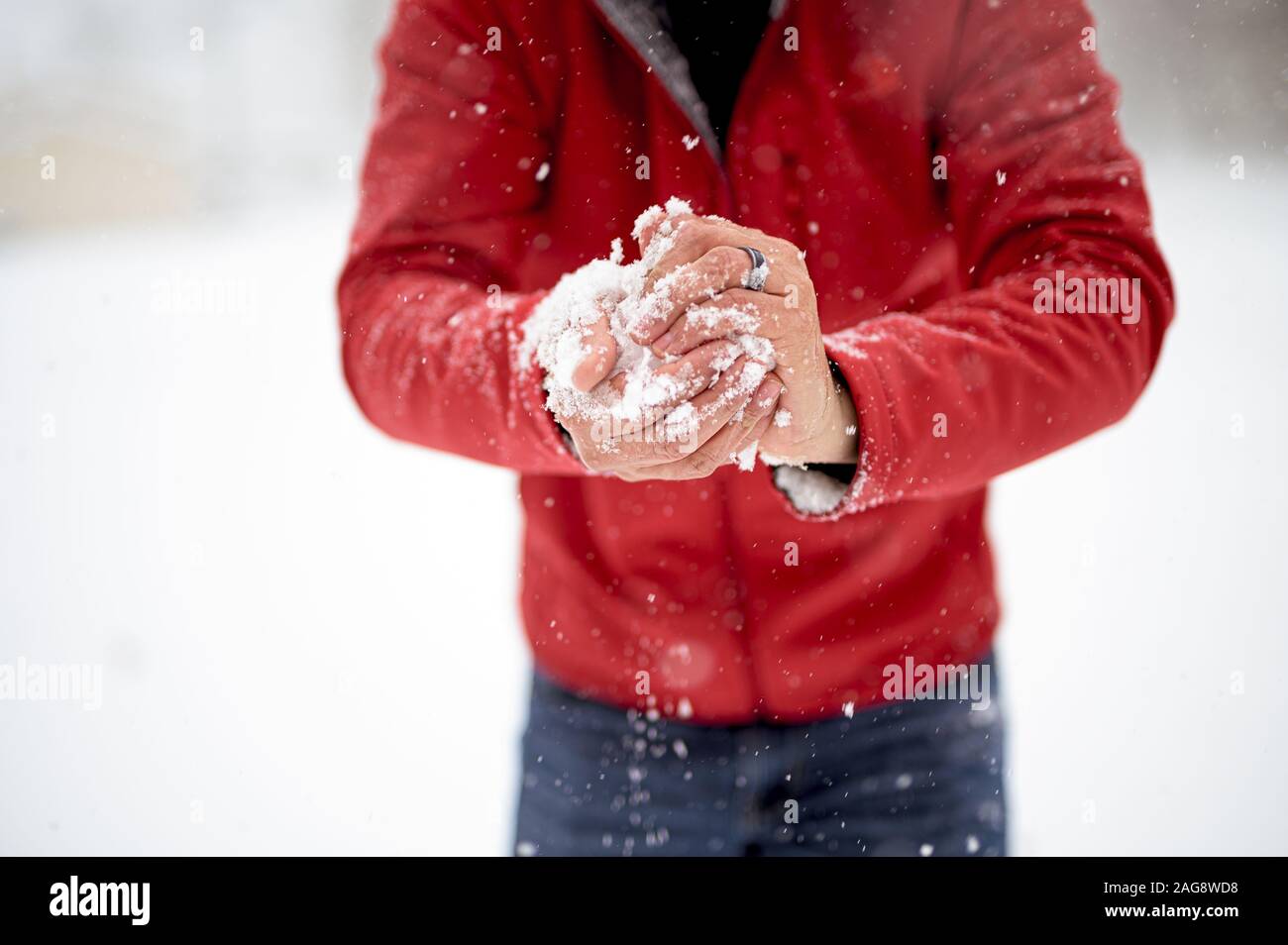 Man making snowball hi-res stock photography and images - Alamy