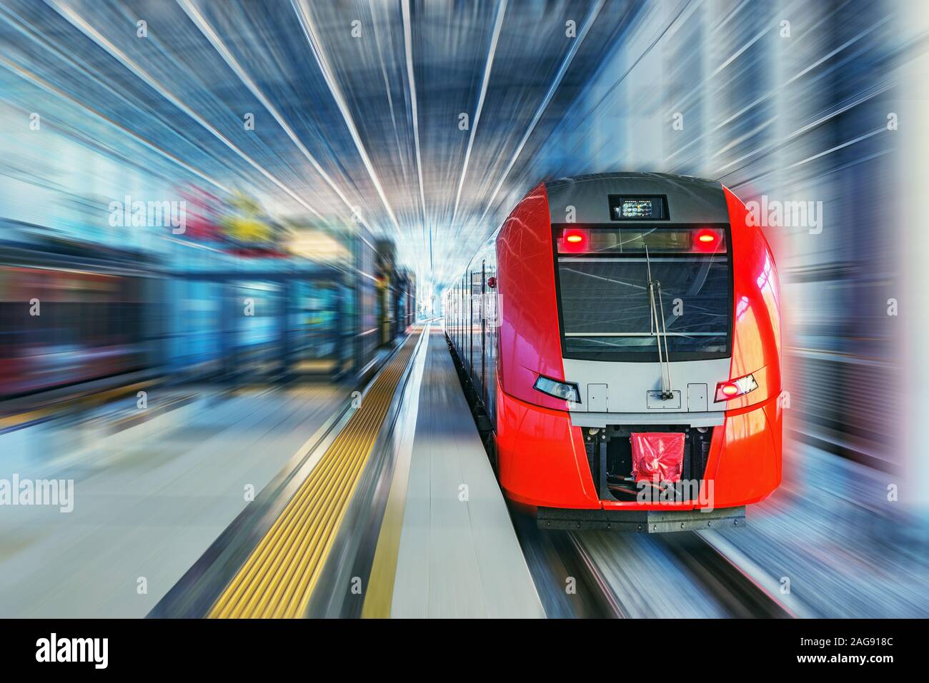 Passenger high speed train moves fast Stock Photo - Alamy
