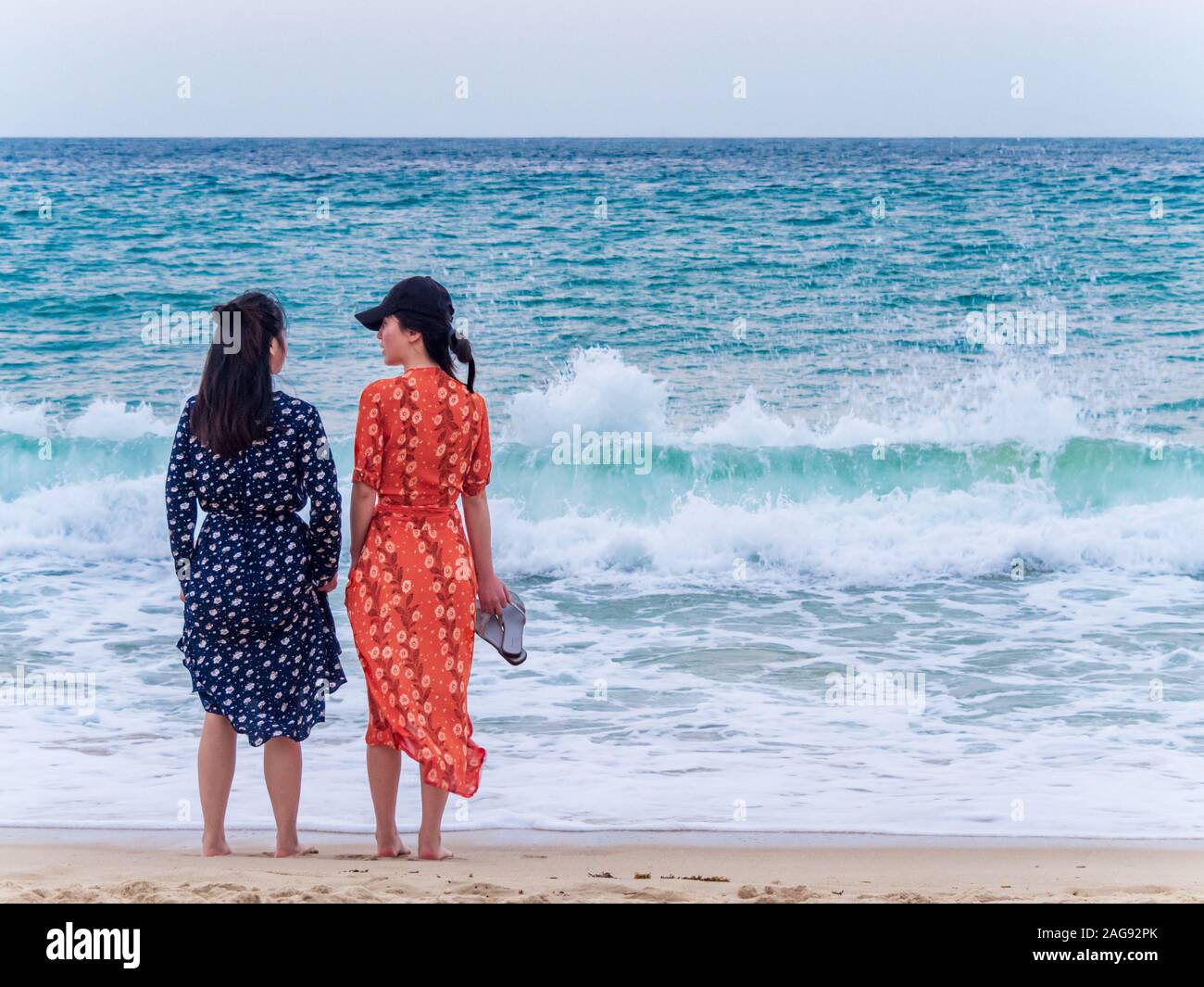 SANYA, HAINAN, CHINA - 4 MAR 2019 - Two young Asian Chinese women ...
