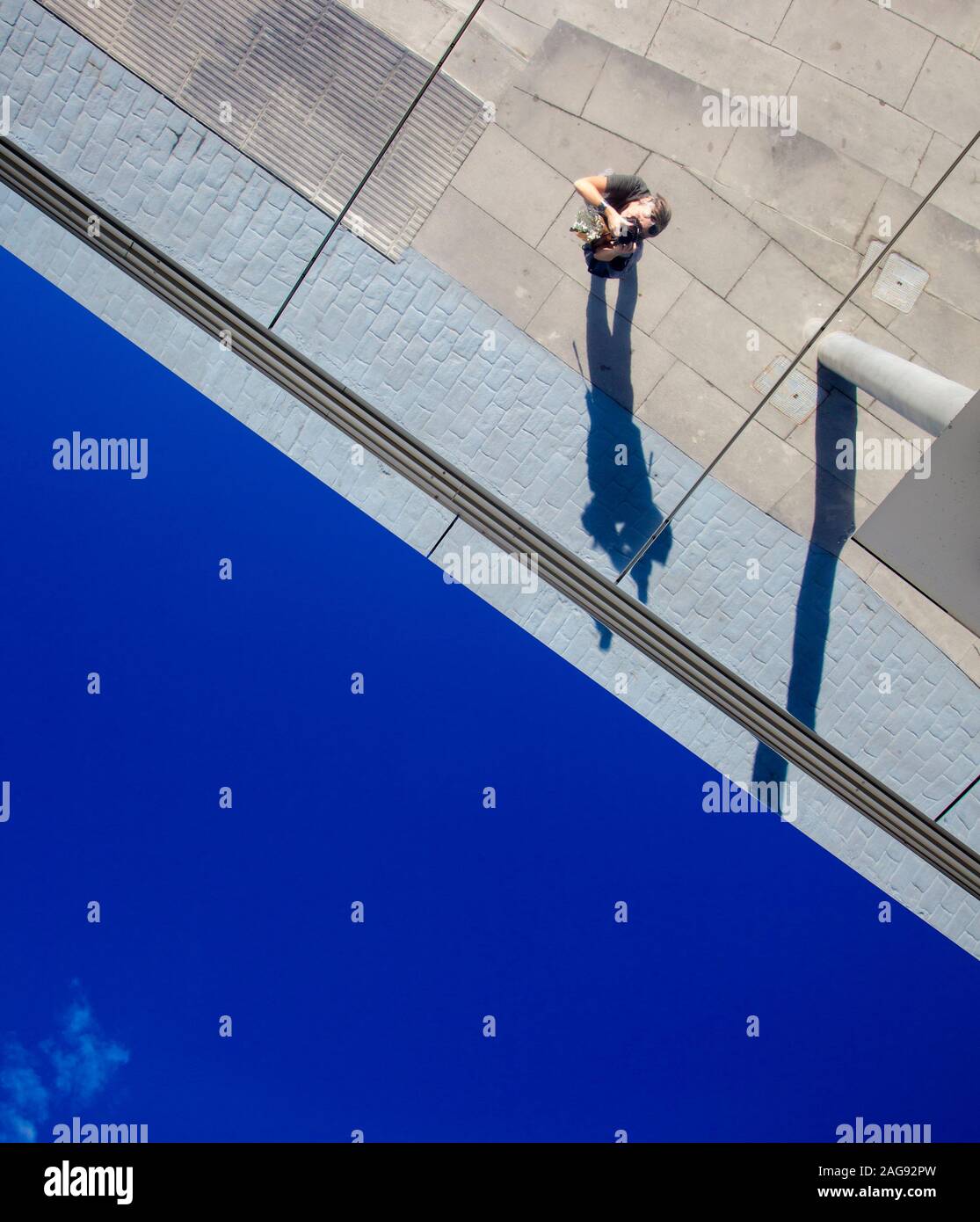 unusual angle photo selfie - photographer aiming camera directly ...