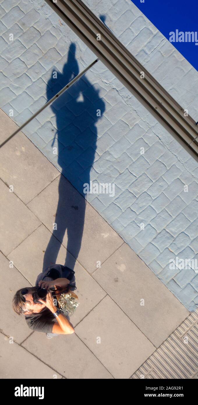 unusual angle photo selfie - photographer aiming camera directly ...