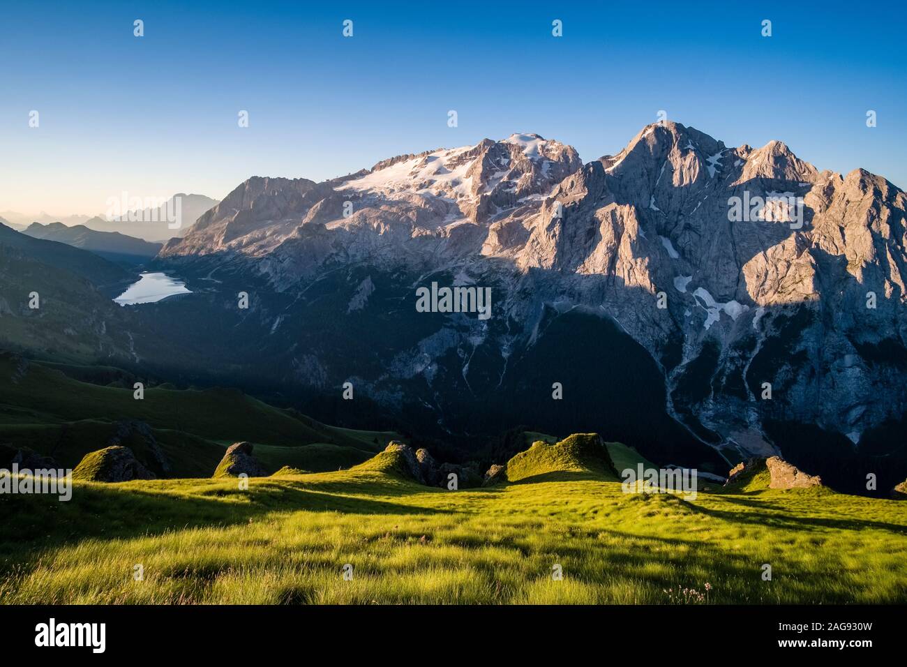 Panoramic view of mountainous dolomiti landscape around Fedaia Lake ...