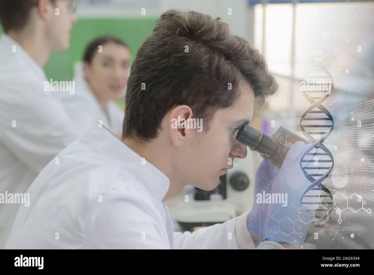 Group of young Laboratory scientists working at lab with test tubes and ...