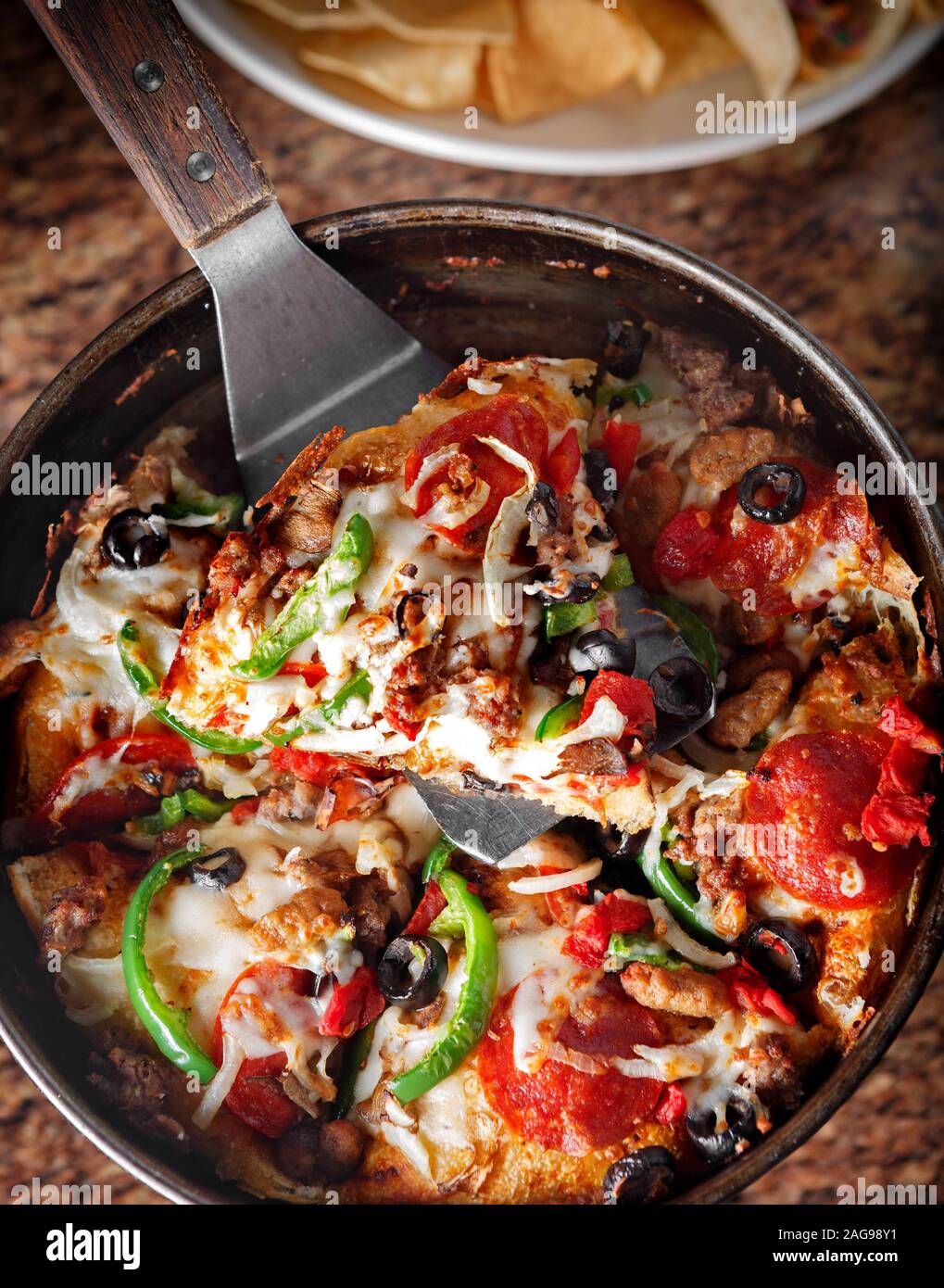 Overhead view of deep dish supreme pizza Stock Photo - Alamy