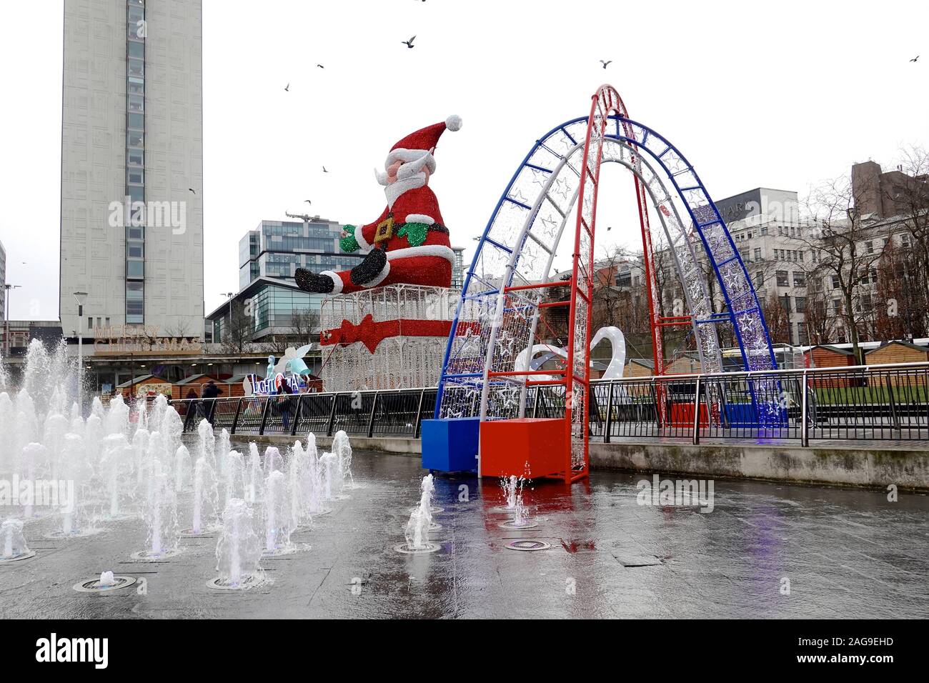 A huge Santa in Piccadilly Gardens, Manchester, UK Stock Photo - Alamy