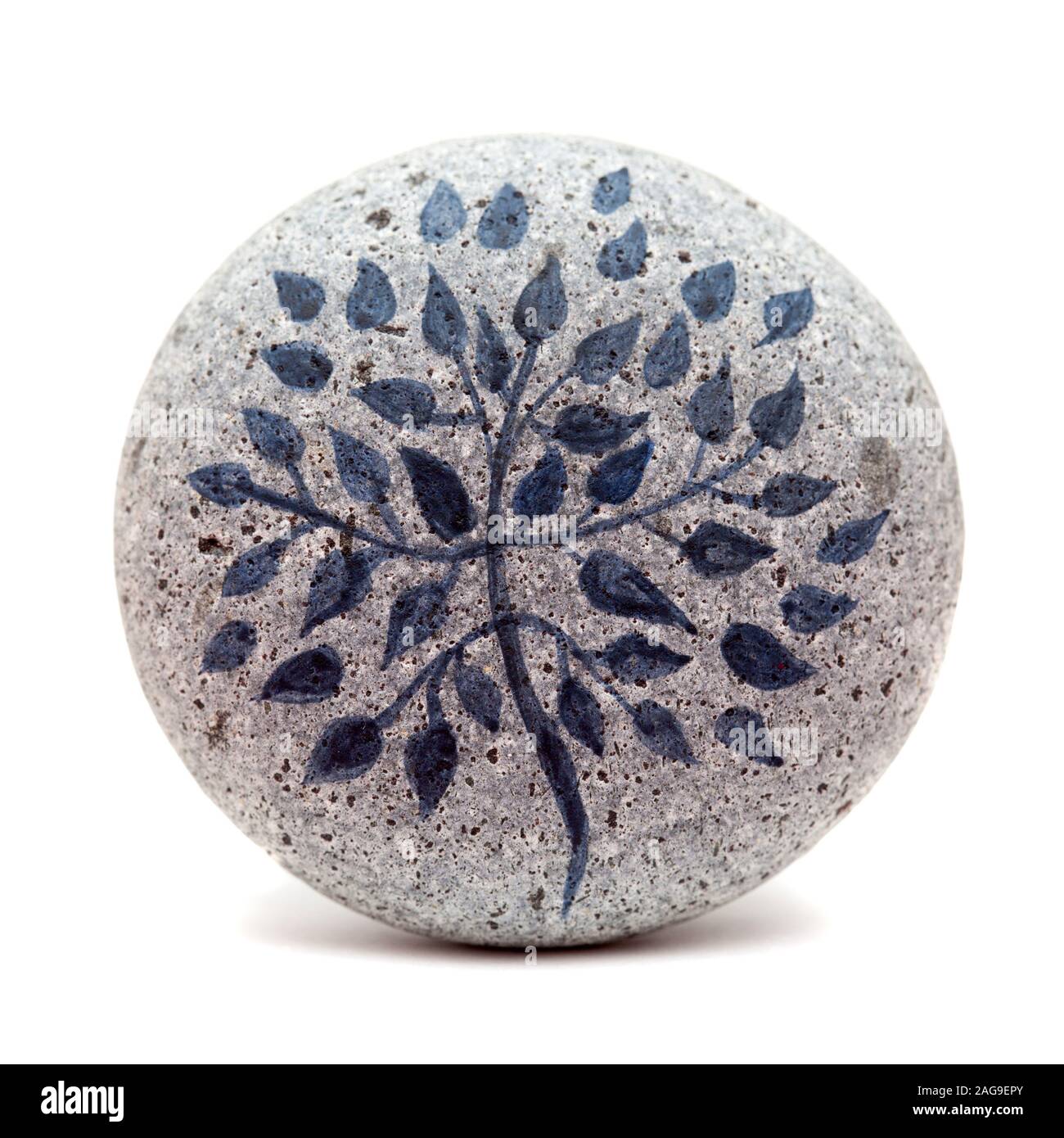 painted pebble paperweight isolate on white background Stock Photo - Alamy
