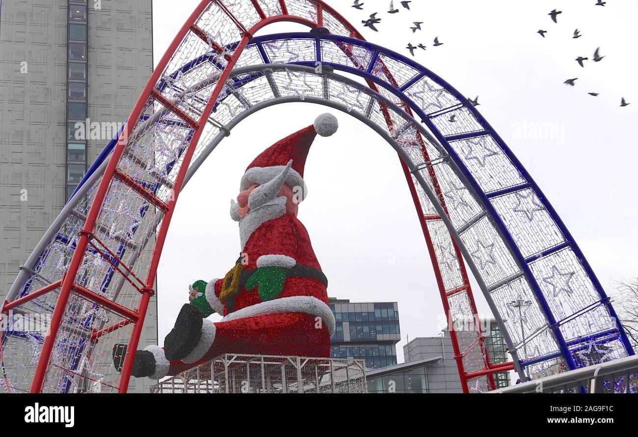 A huge Santa in Piccadilly Gardens, Manchester, UK Stock Photo - Alamy
