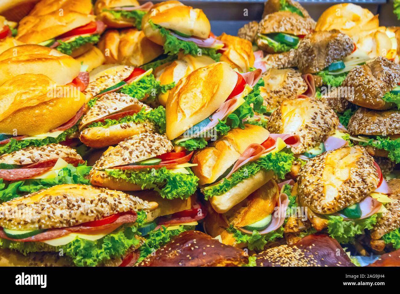 Lots of sandwiches in a display window of a diner cooking for sale ...