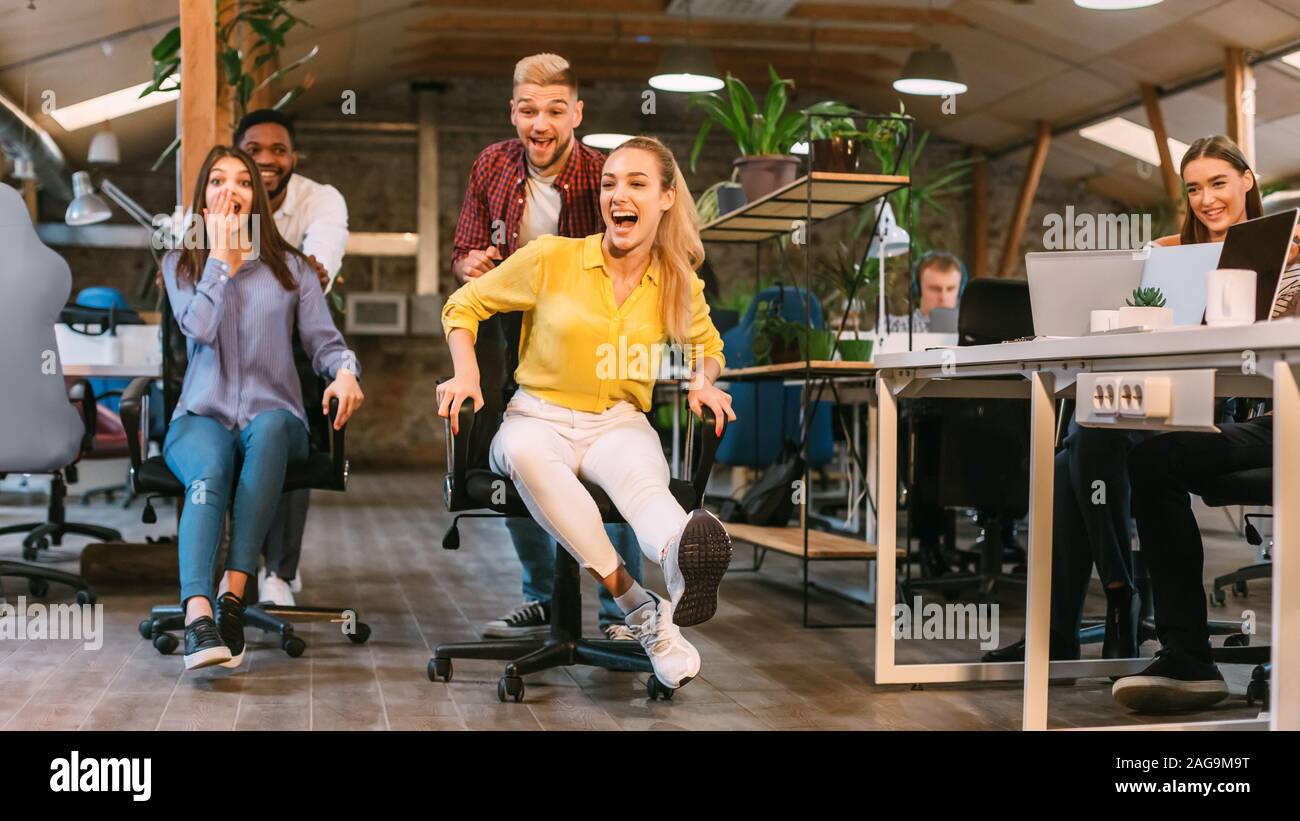 Office chair race hi-res stock photography and images - Alamy