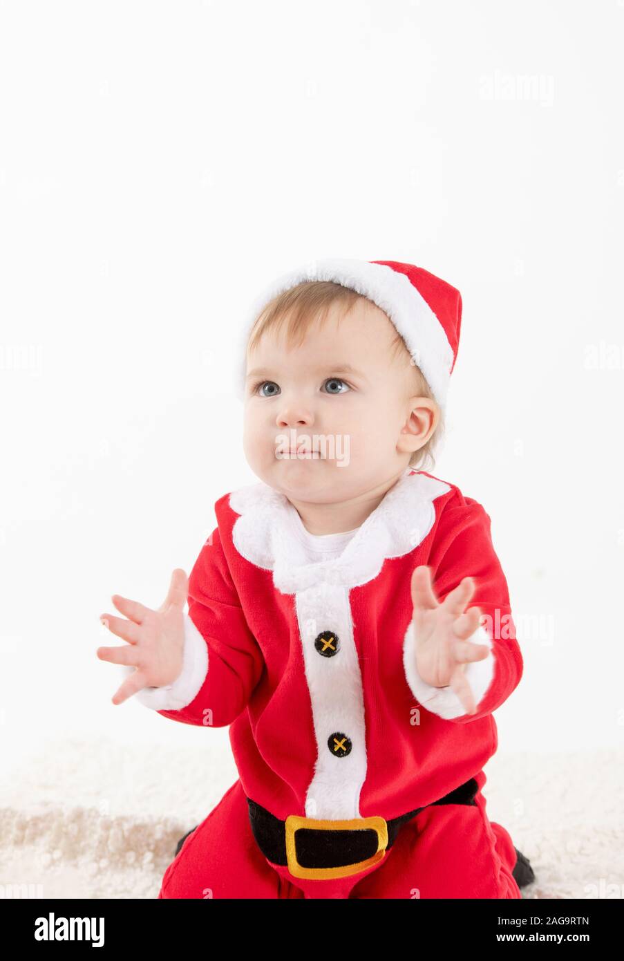 Stock vertical photo of a studio with a white background of a baby ...