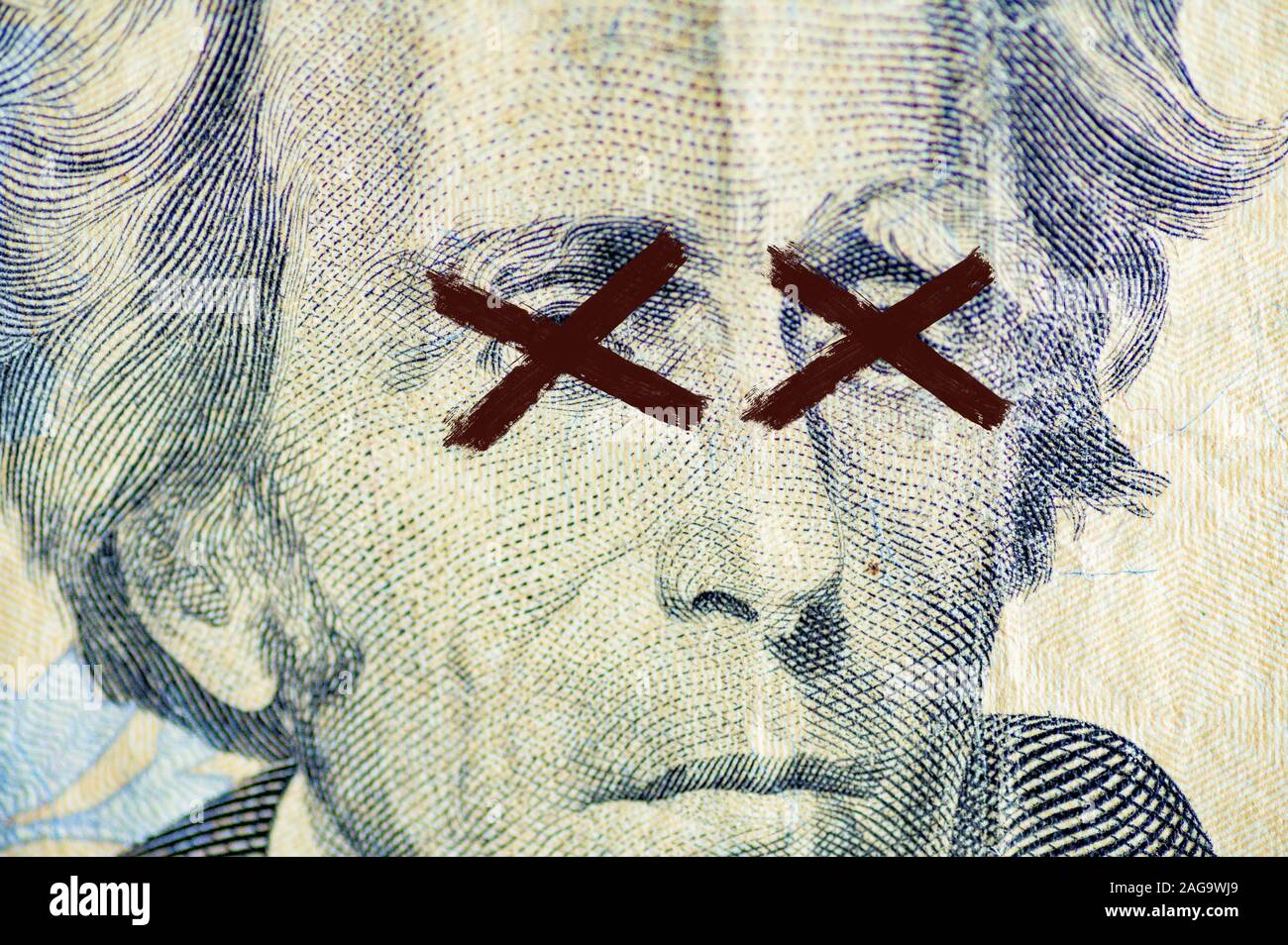 Closeup shot of the Andrew Jackson, on the dollar bill with x painted ...