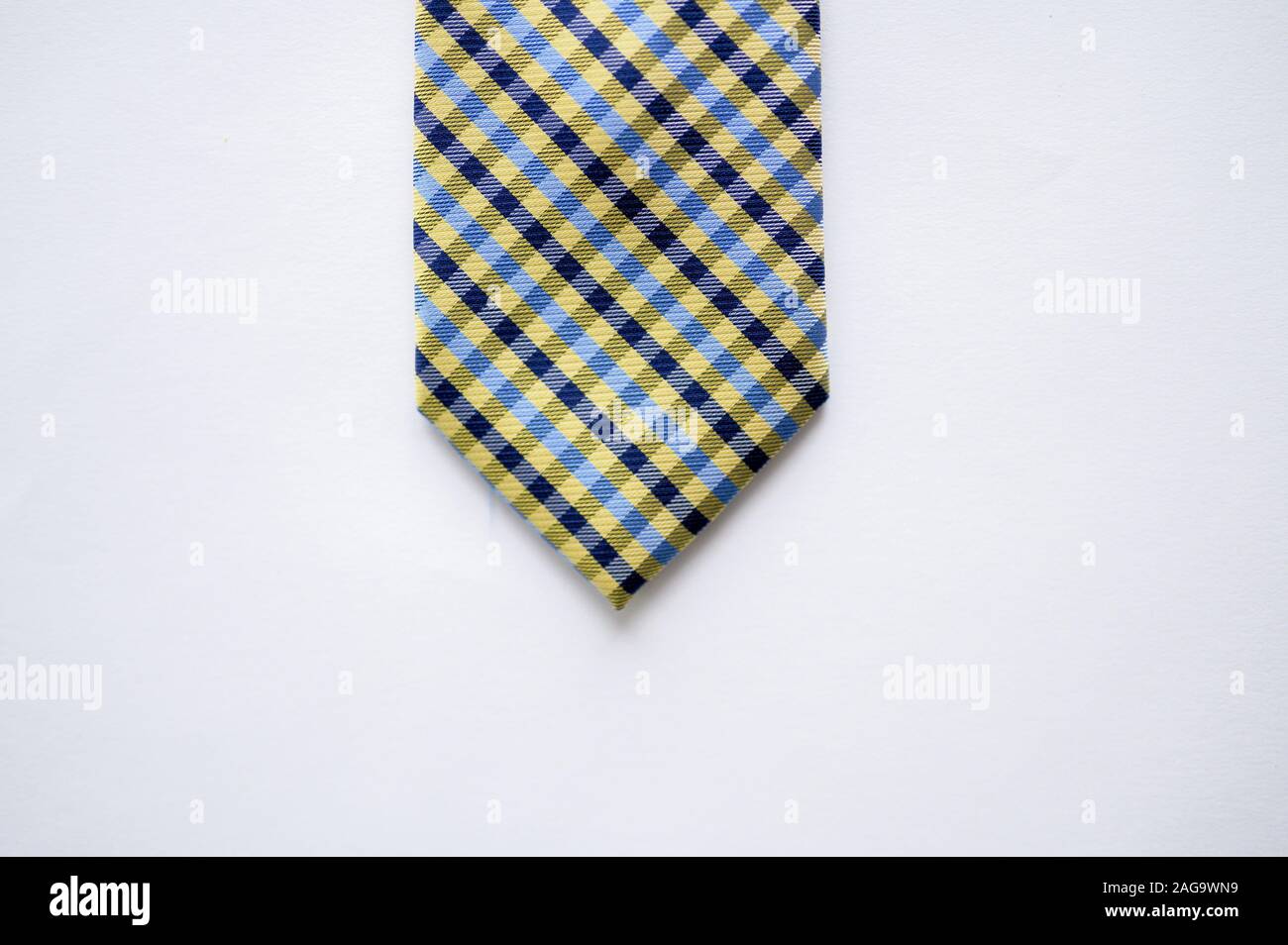 Overhead shot of a colorful striped tie on a white surface Stock Photo ...