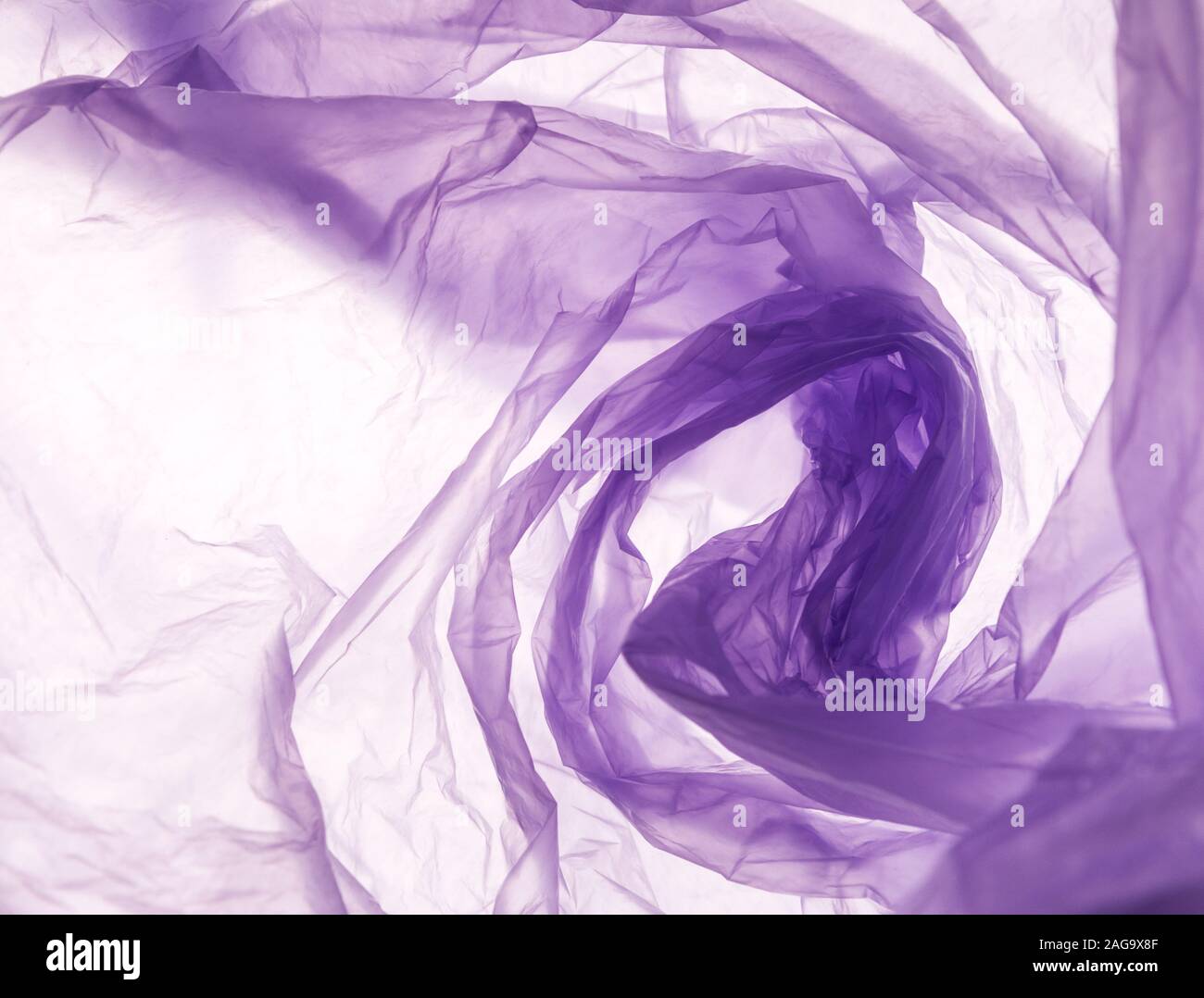 Plastic waste pattern of purple bag over white background Stock Photo ...