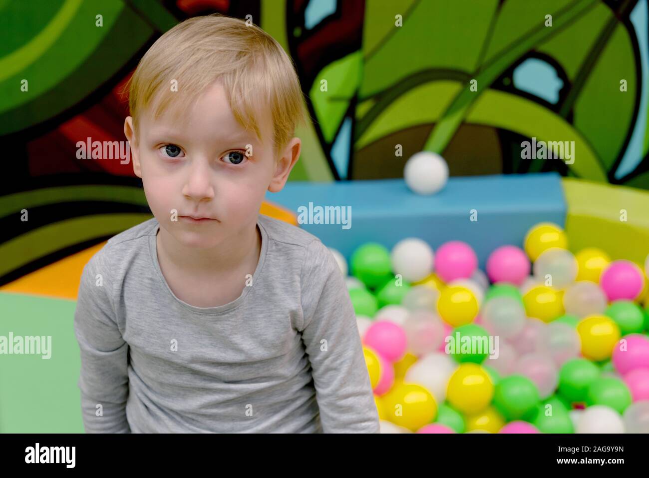 Four year old boy playing at new playground kindergarten. Four years ...