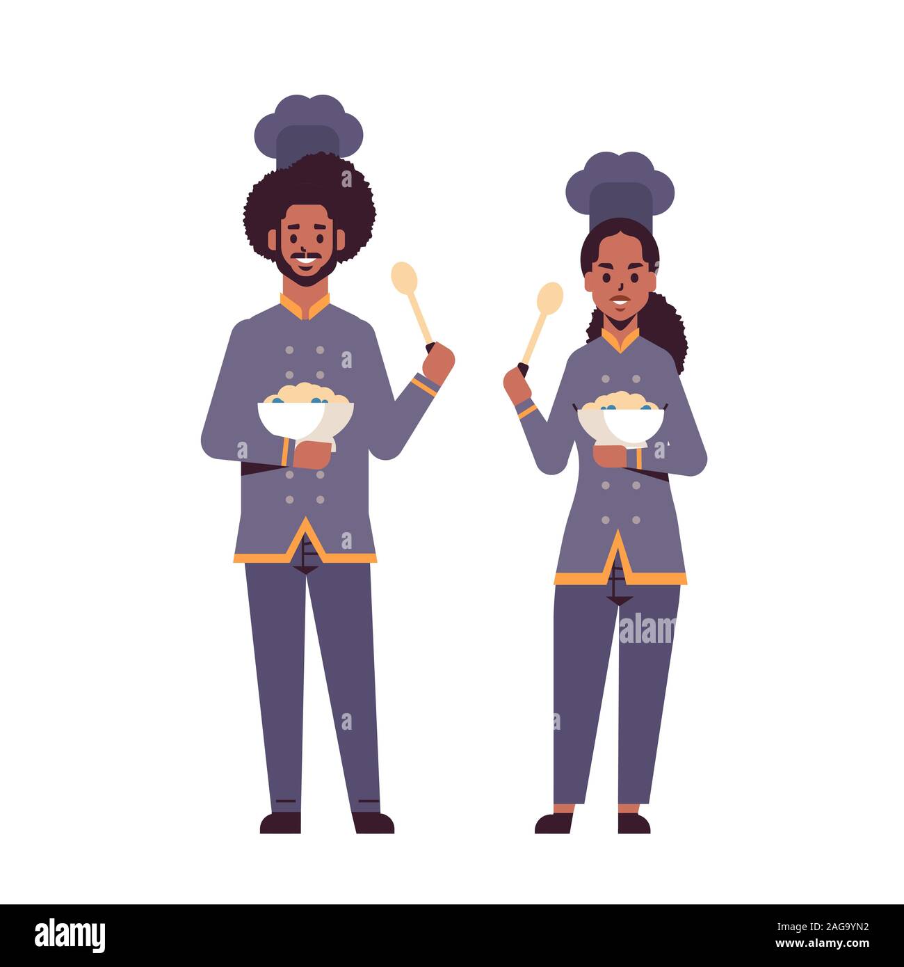 cooks couple professional chefs holding plates with porridge and spoons ...