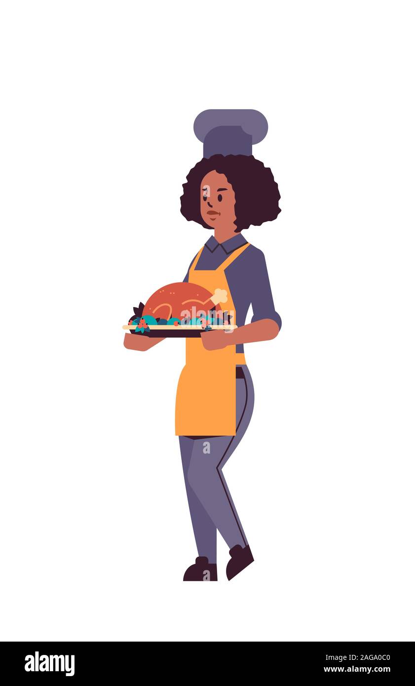 female professional chef cook holding tray with roasted chicken woman ...