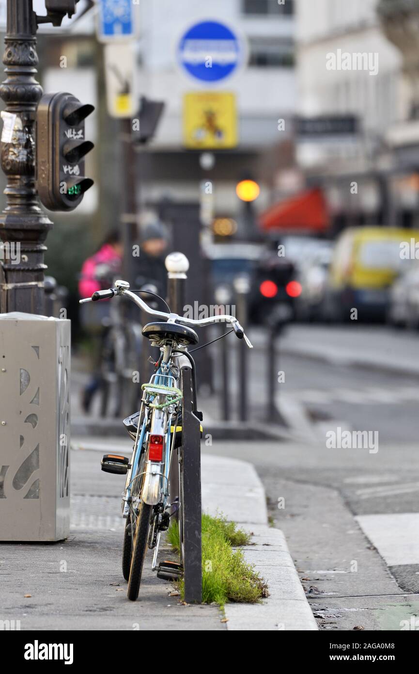 Cyclist in Paris street - France Stock Photo - Alamy