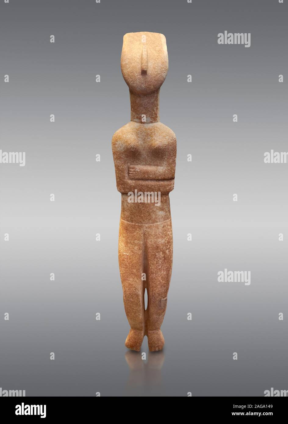 Female Cycladic statue figurine with folded arms of the Spedos and ...
