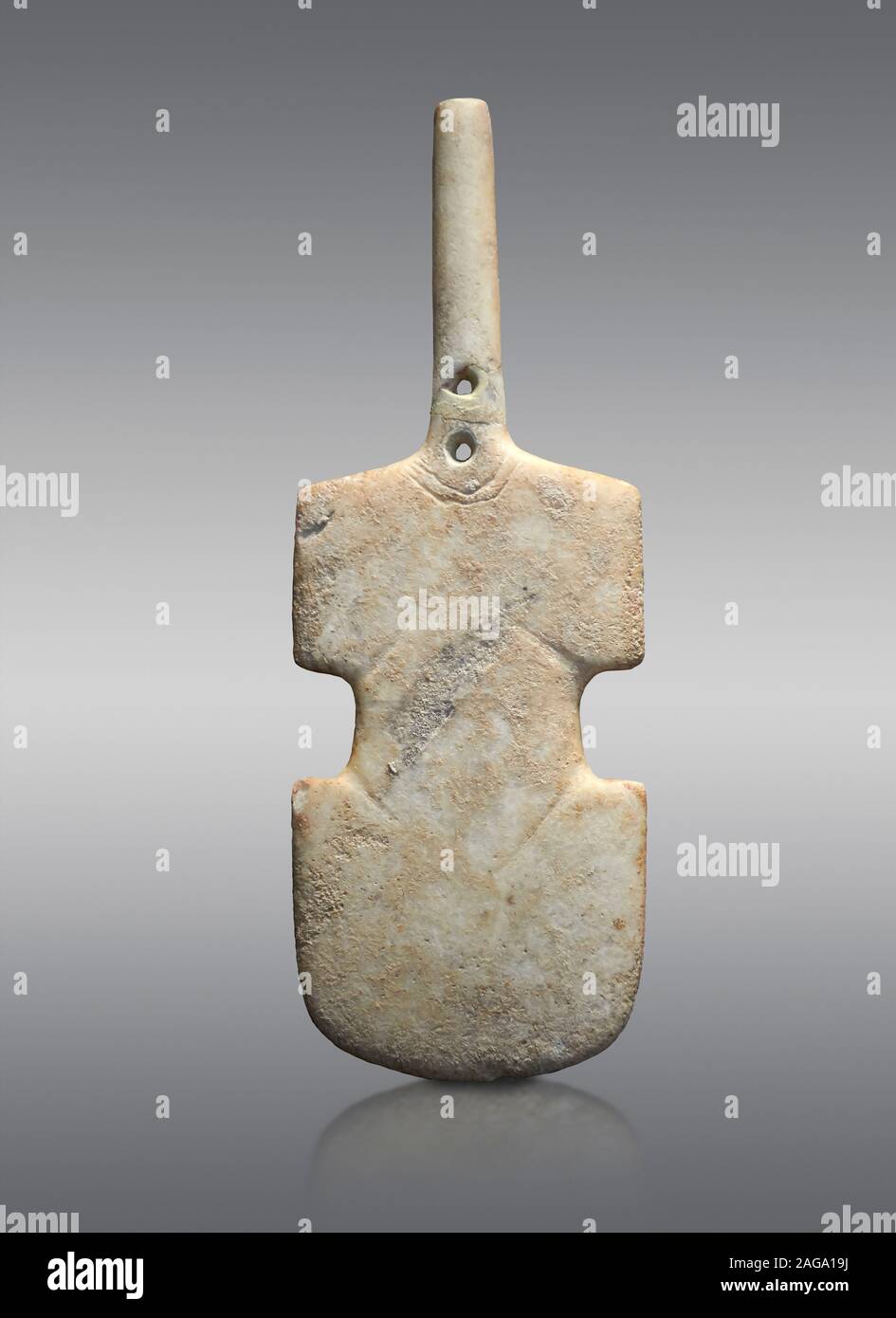 Cycladic violin shaped figurine. Early Cycladic Period I (Grotta-Pelos ...