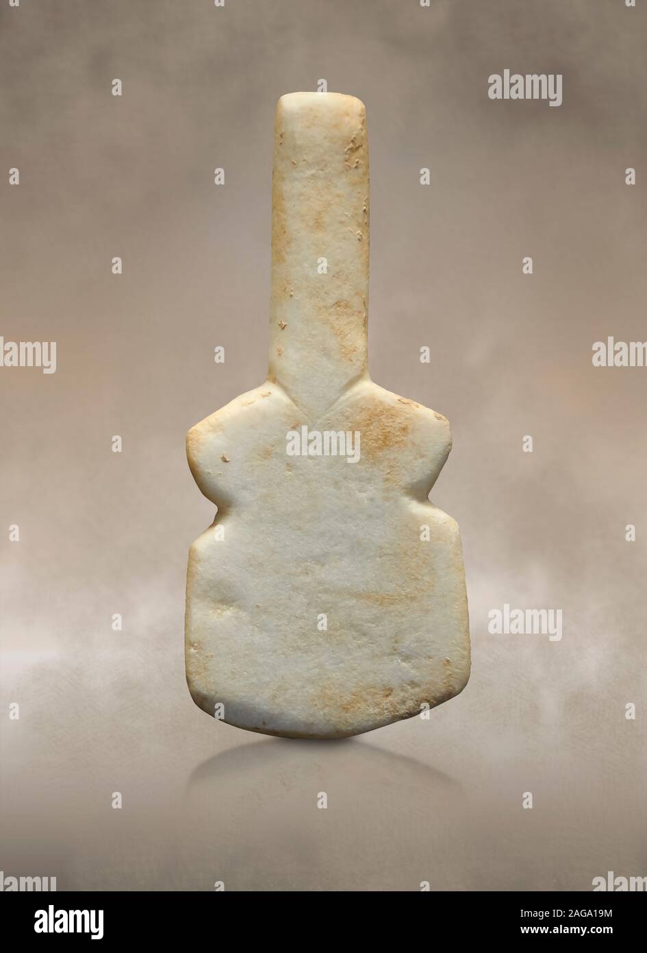 Cycladic violin shaped figurine. Early Cycladic Period I (Grotta-Pelos ...