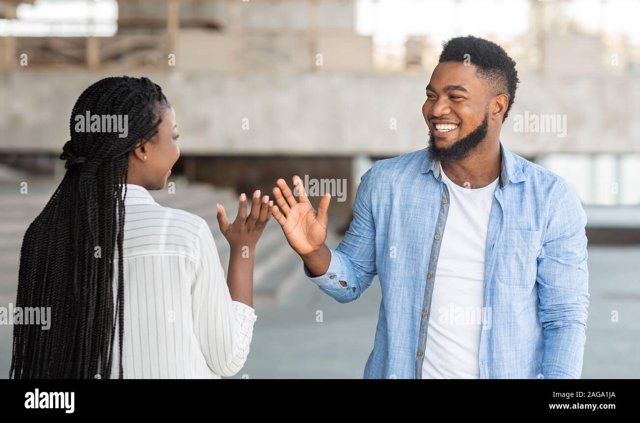 Woman waving goodbye on street hi-res stock photography and images - Alamy