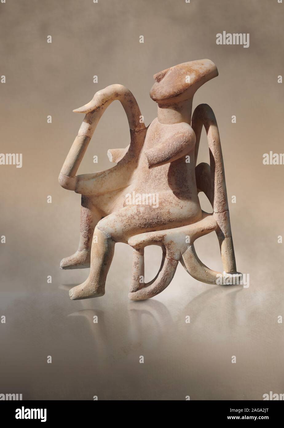 The 'Harpist of Keros' a seated parian marble female Cycladic figurine ...