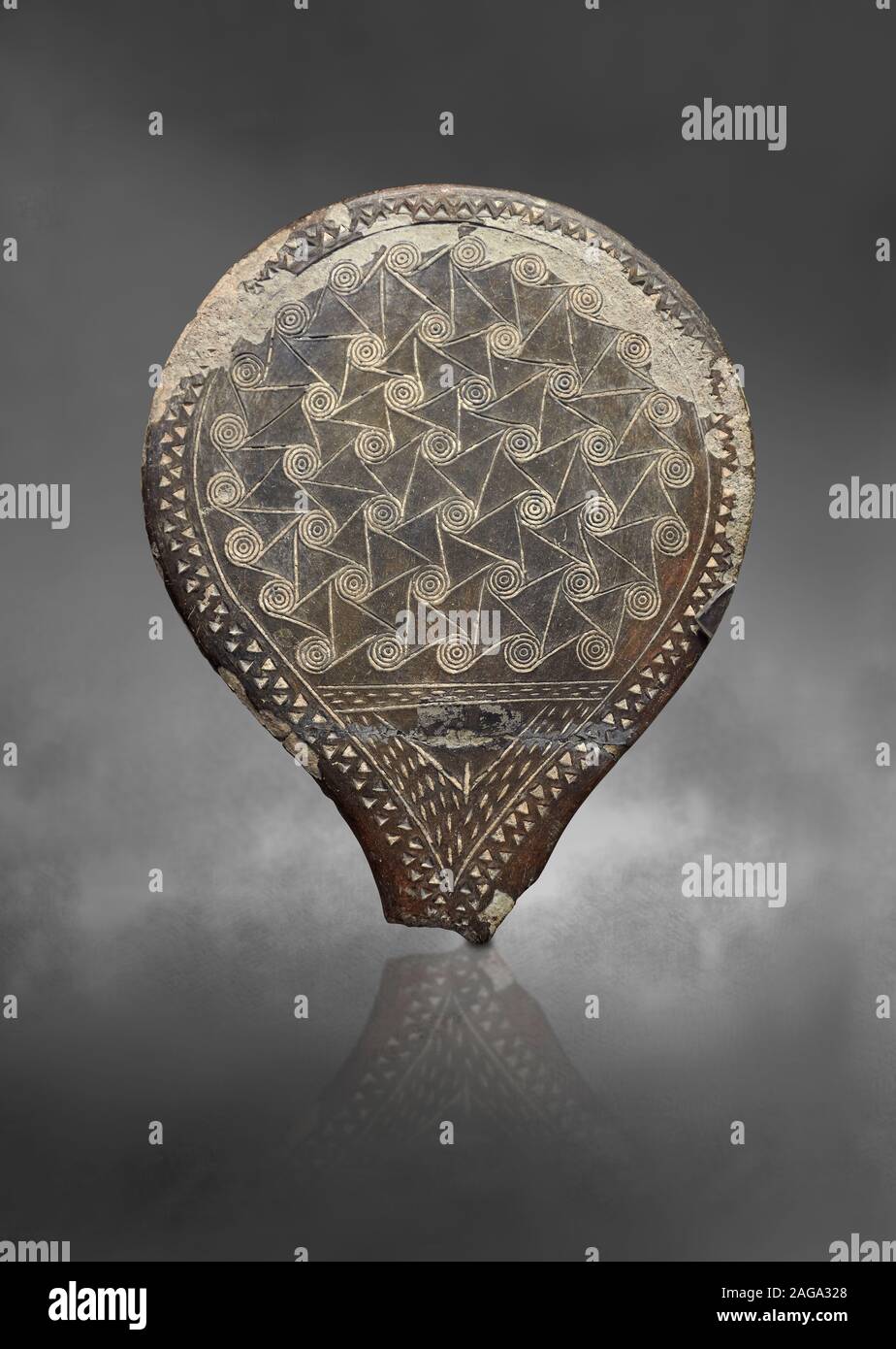 Cycladic terracotta 'frying pan' with incied spiral decoration from ...