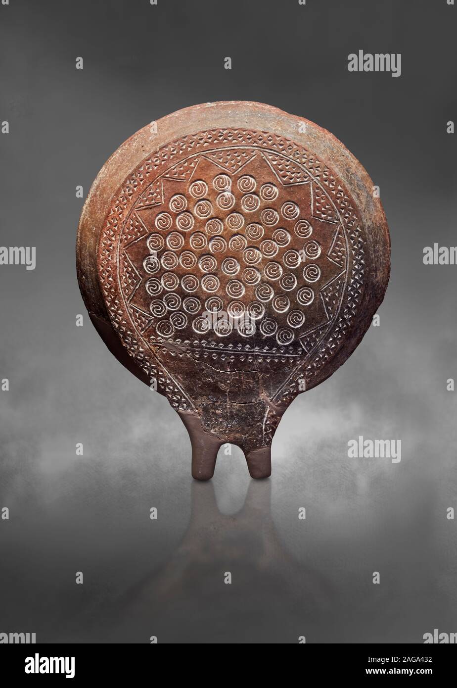 Cycladic terracotta 'frying pan' with incied spiral decoration from ...
