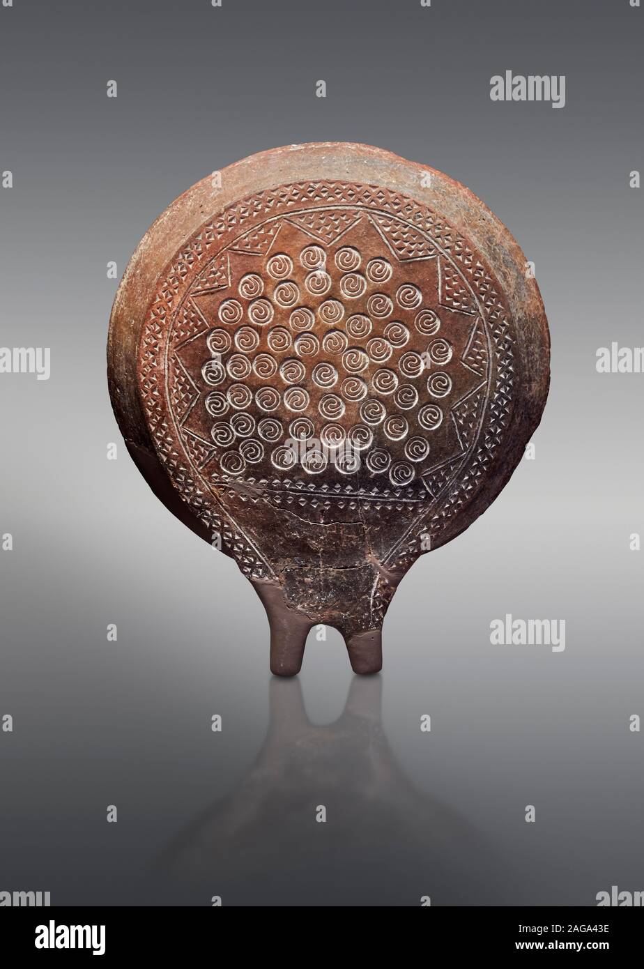 Cycladic terracotta 'frying pan' with incied spiral decoration from ...