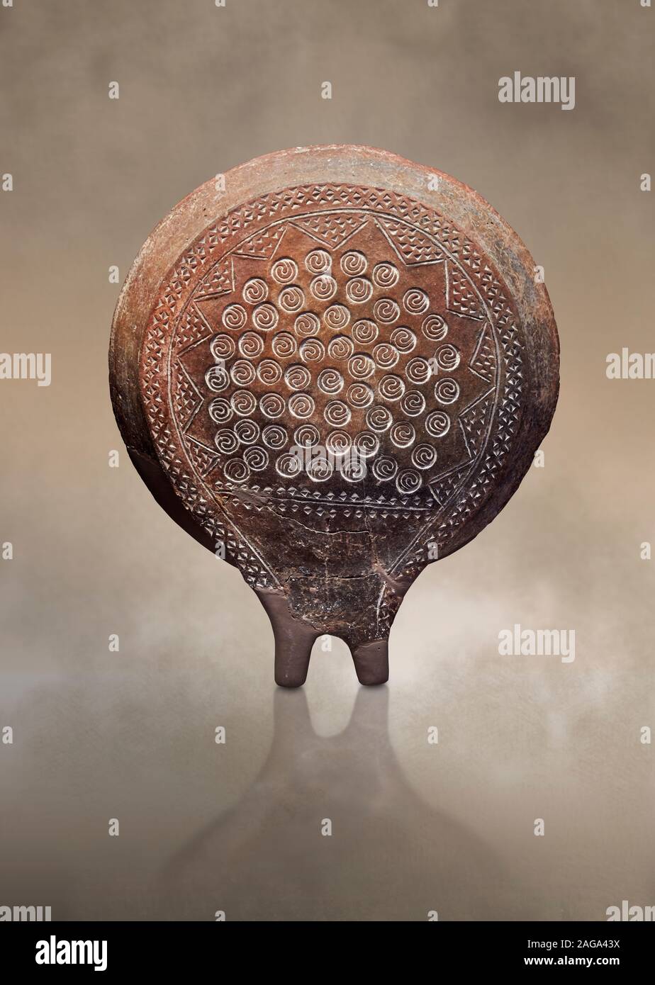 Cycladic terracotta 'frying pan' with incied spiral decoration from ...