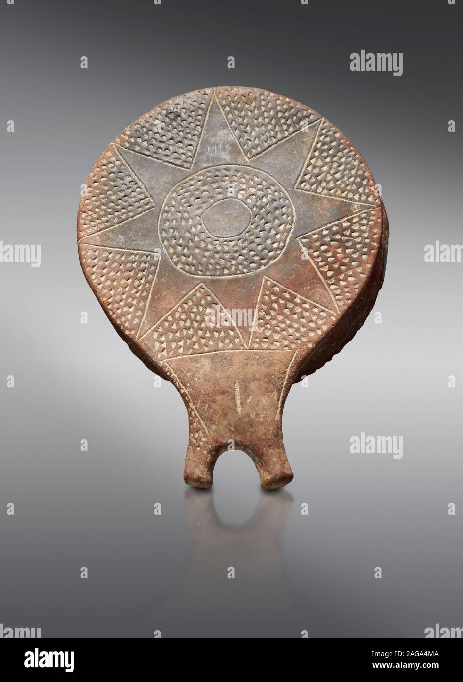 Cycladic terracotta 'frying pan' with incied star decoration from ...