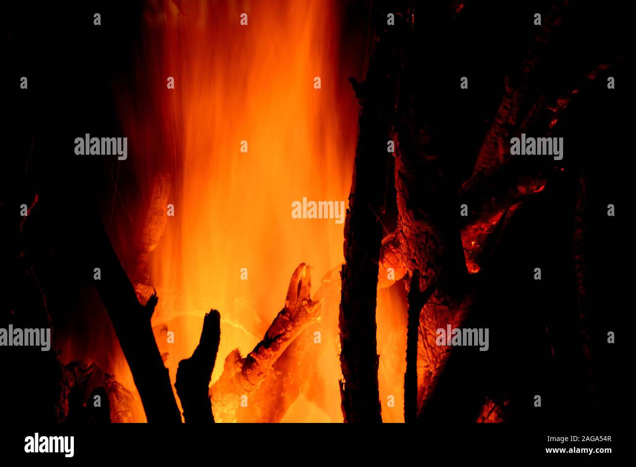 Close up of burning logs in the fireplace on black background Stock ...