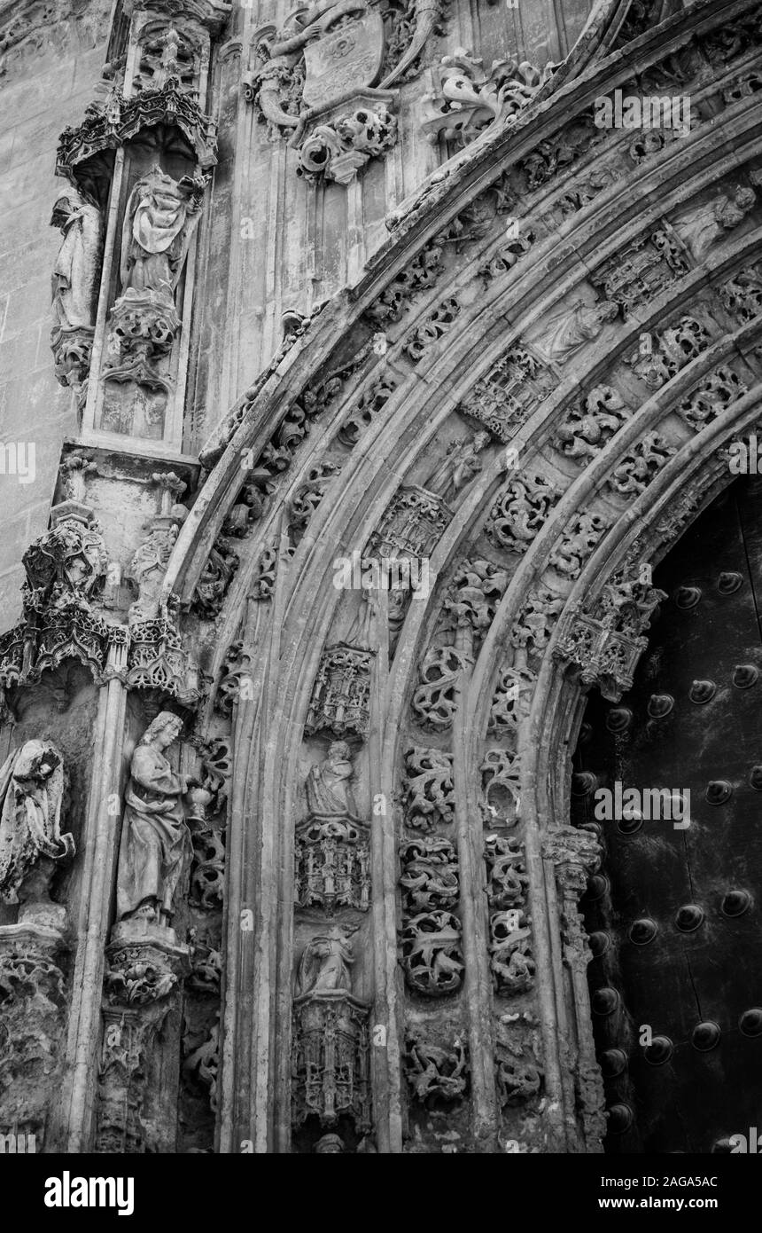 Beautiful grayscale closeup shot of a historic arch-shaped building ...