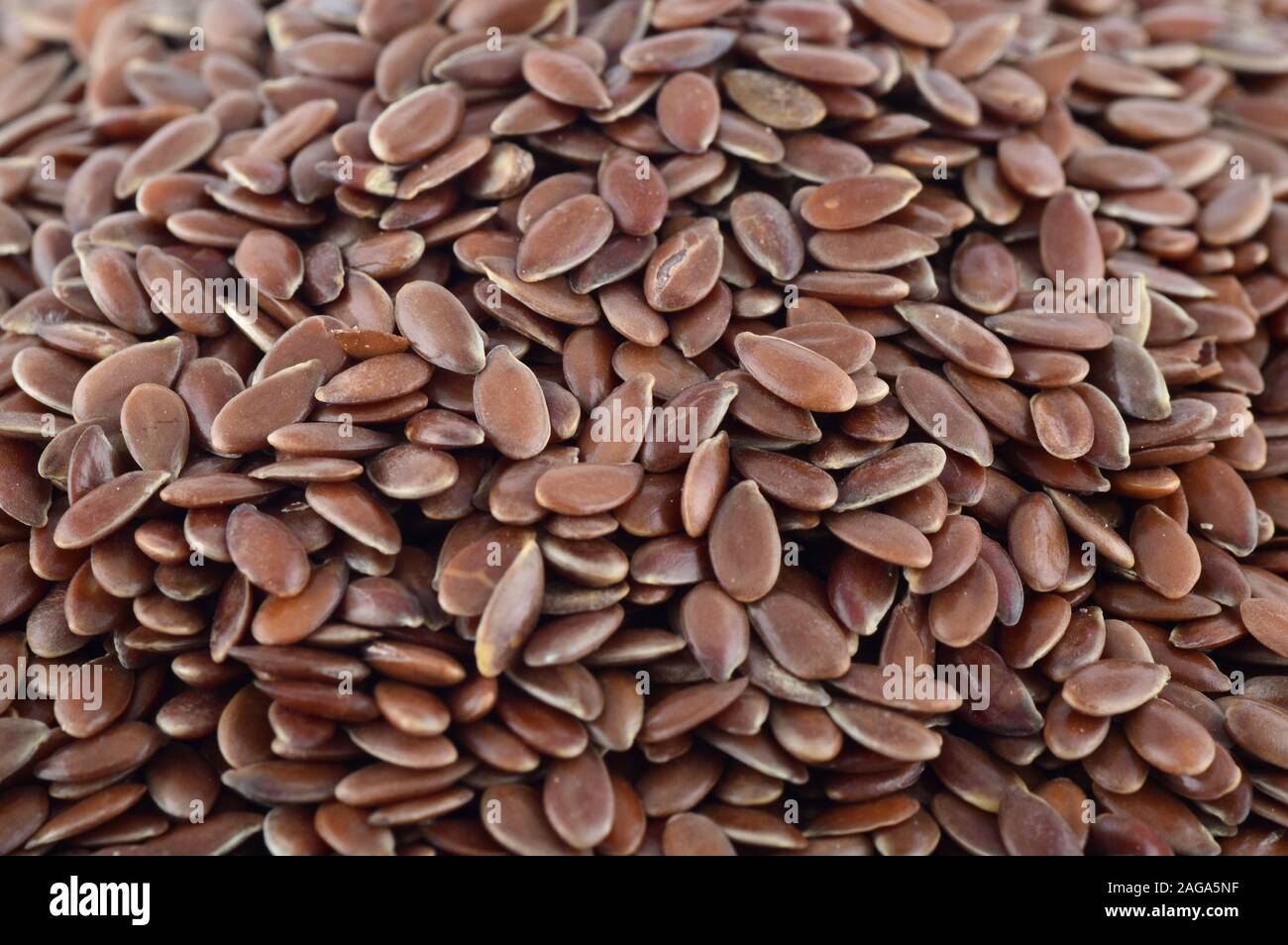 close up of flax seeds isolated on white background Stock Photo - Alamy