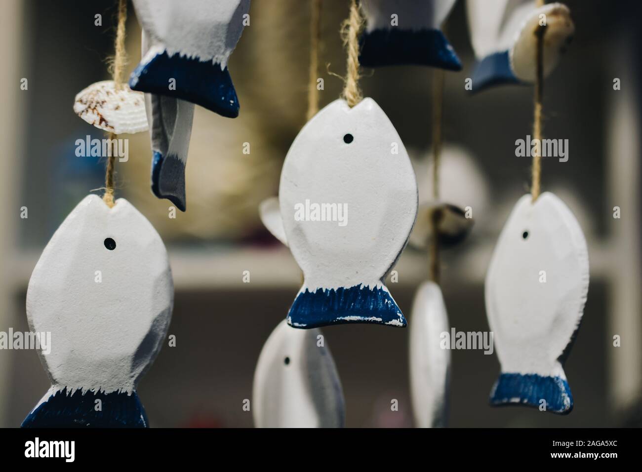 Hand made wooden fish figure as artwork Stock Photo - Alamy