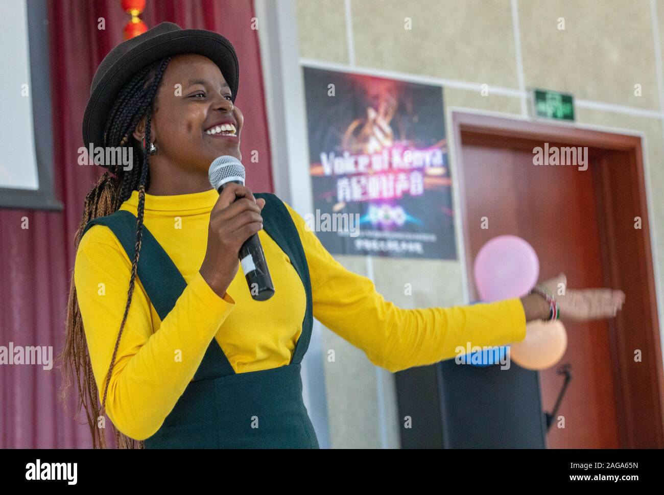 Nairobi, Kenya. 18th Dec, 2019. A competitor sings Chinese popular song ...