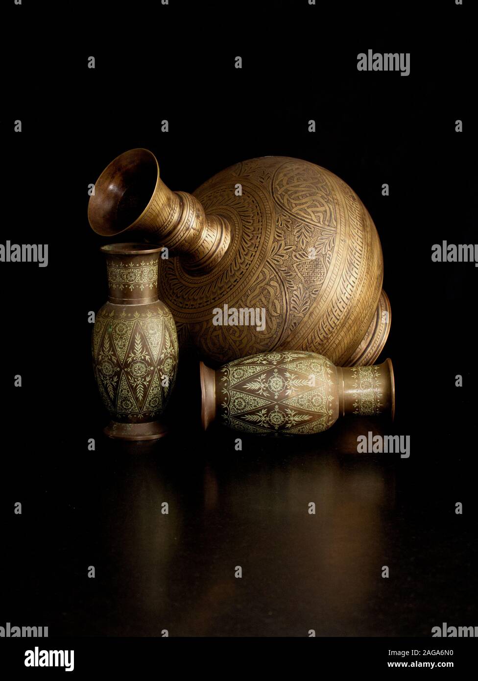 Classical Still Life setting with Brass and Copper Urn and Vases ...