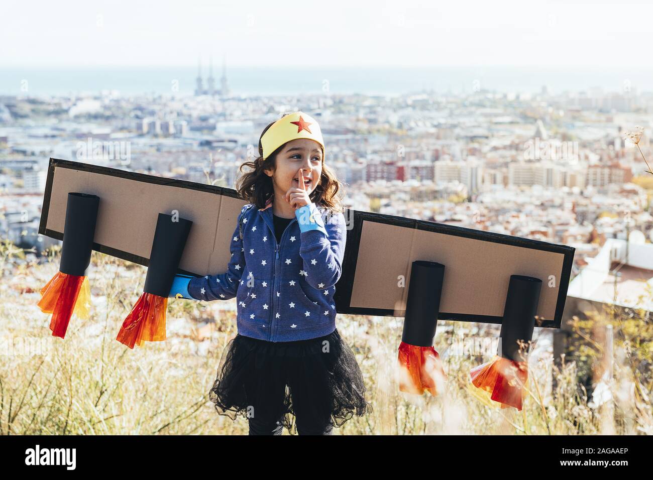 beautiful little child girl disguised as a superhero with homemade ...