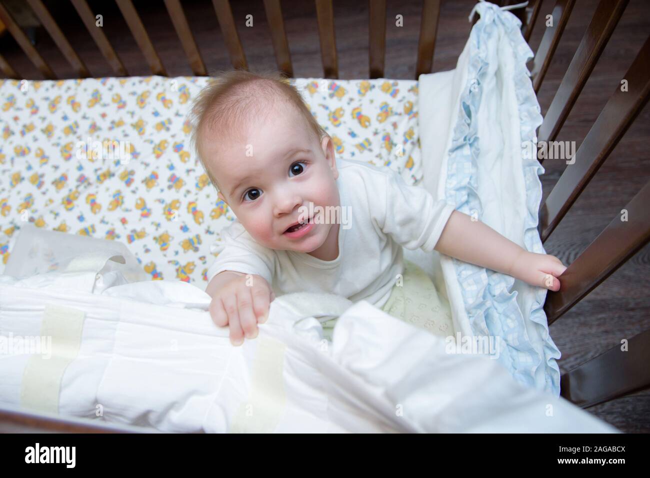 the child looks at the parents' view from above Stock Photo - Alamy
