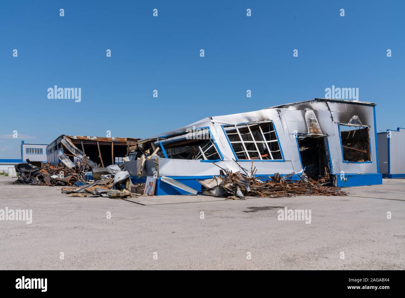 the burned and destroyed structure is made of profiled sheet. view from ...