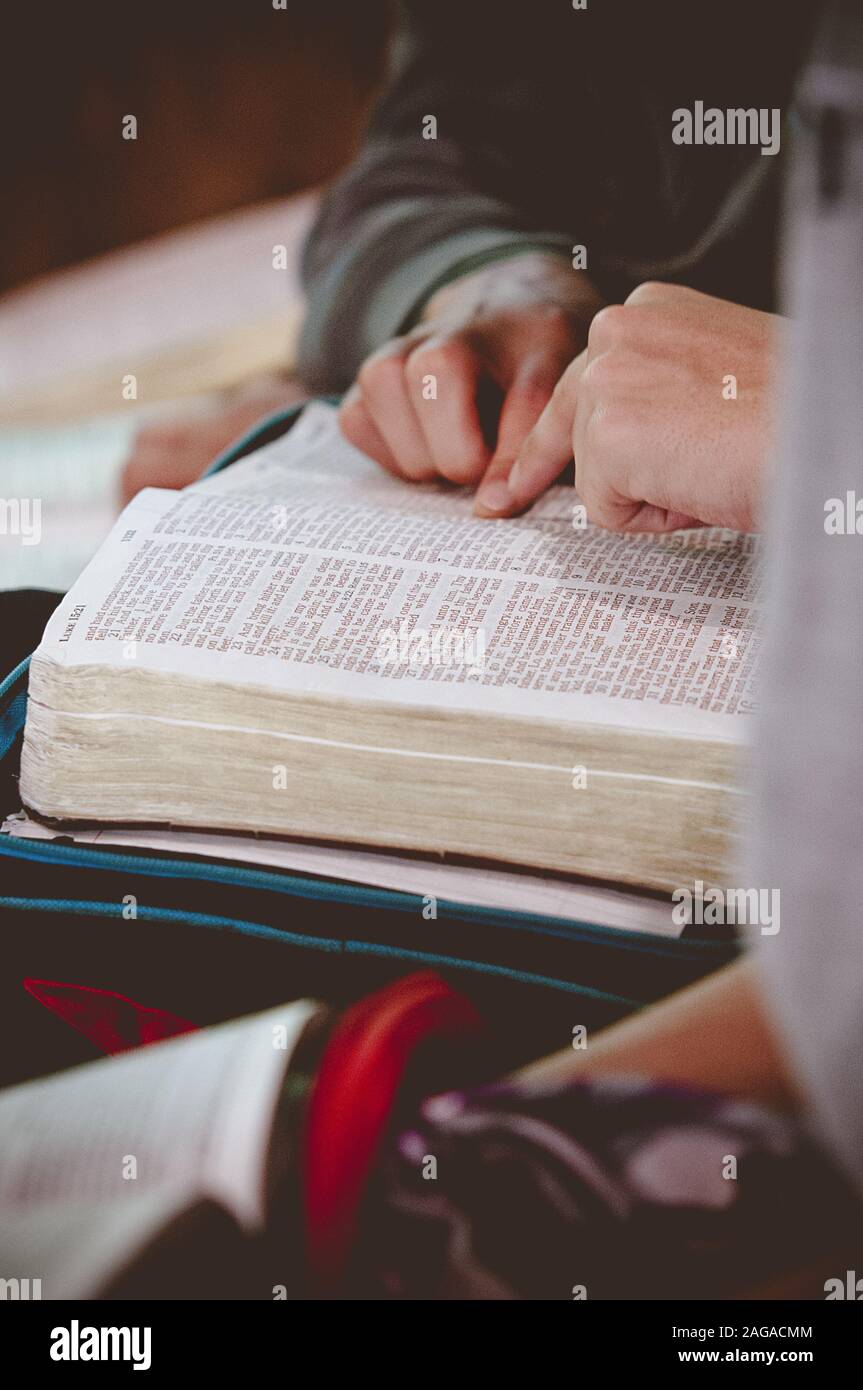 Pointing to the bible hi-res stock photography and images - Alamy