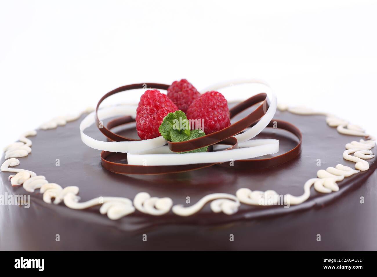 Chocolate cake with raspberries Stock Photo - Alamy