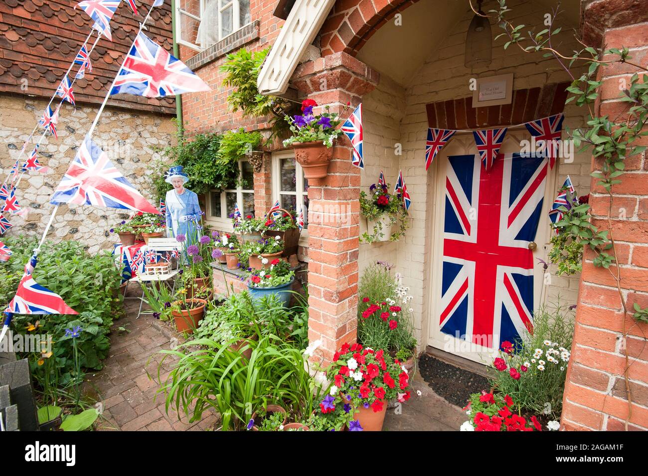 The village of Albury near Guildford in Surrey decorating their homes ...