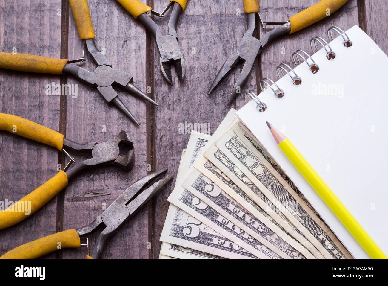 Tools and notebook to make a budget of remodeling or DIY at home Stock ...