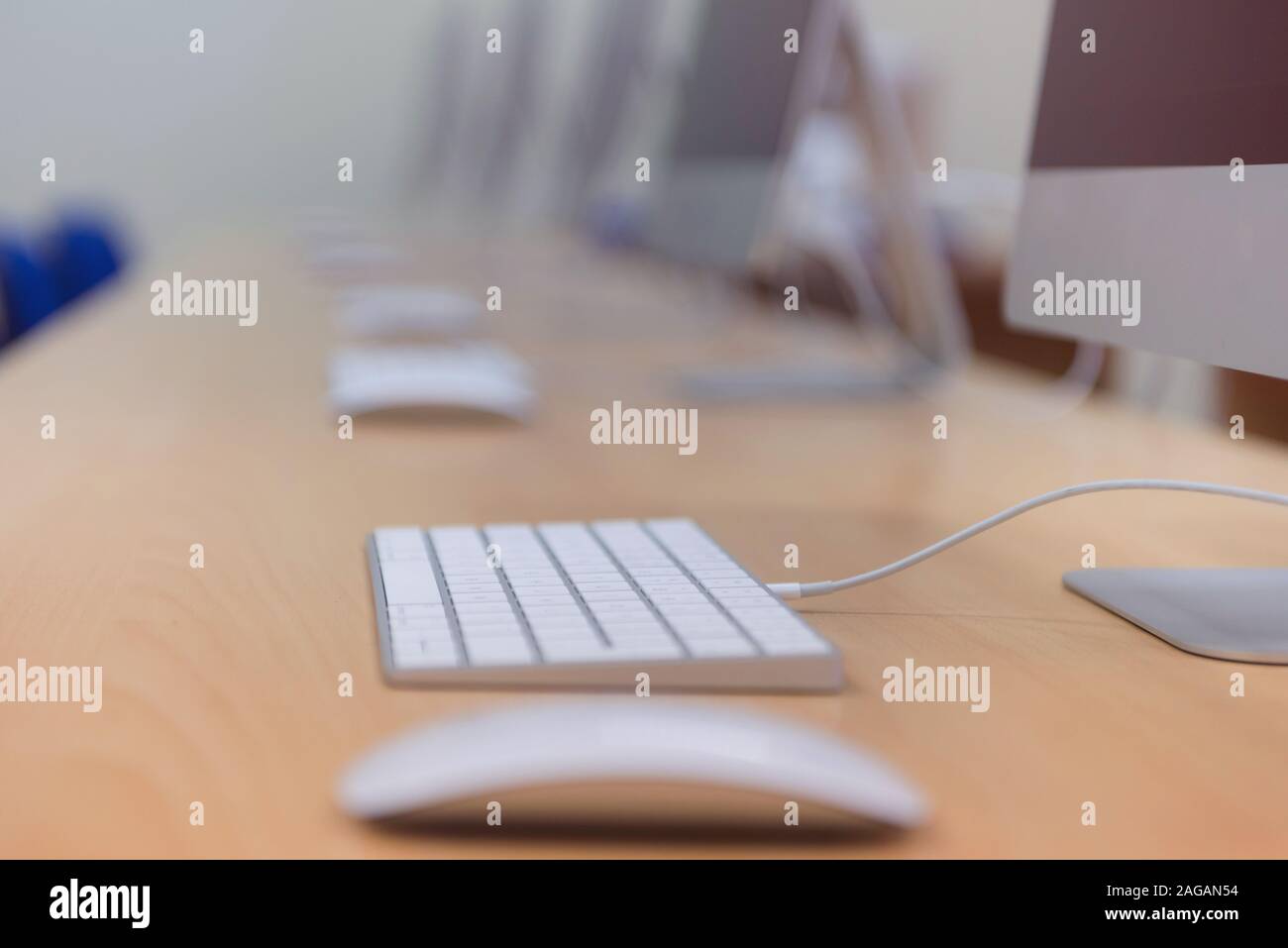 Modern office with computers on desks. Empty computer room in college ...