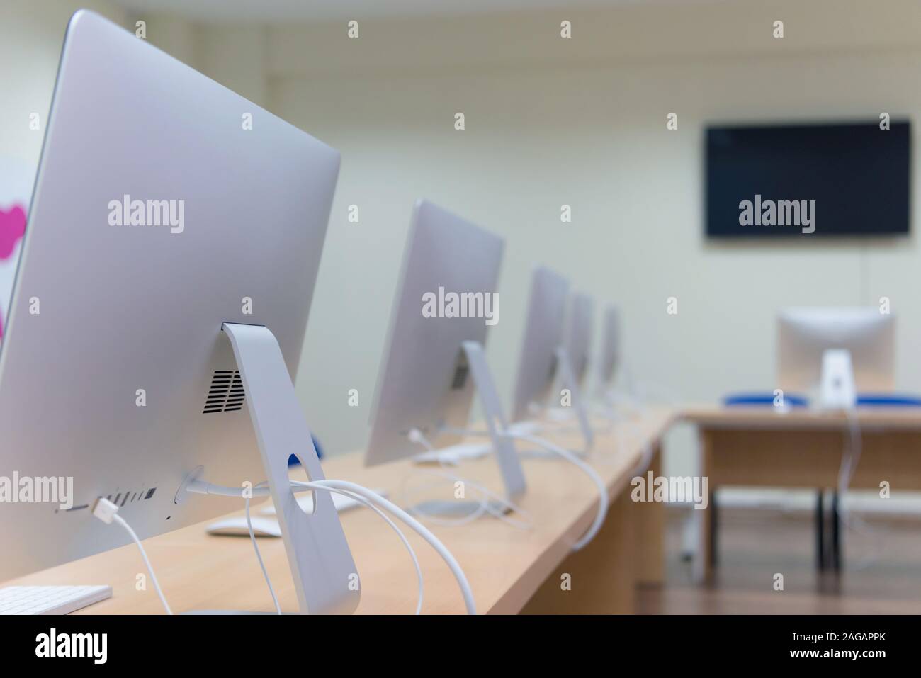 Modern office with computers on desks. Empty computer room in college ...