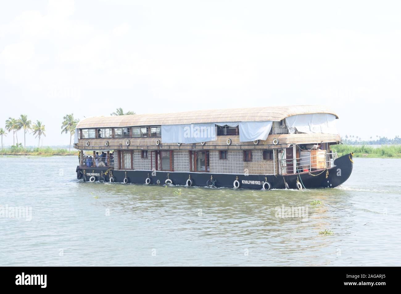 Premium Houseboat Cruises in Kerala Backwaters Stock Photo - Alamy